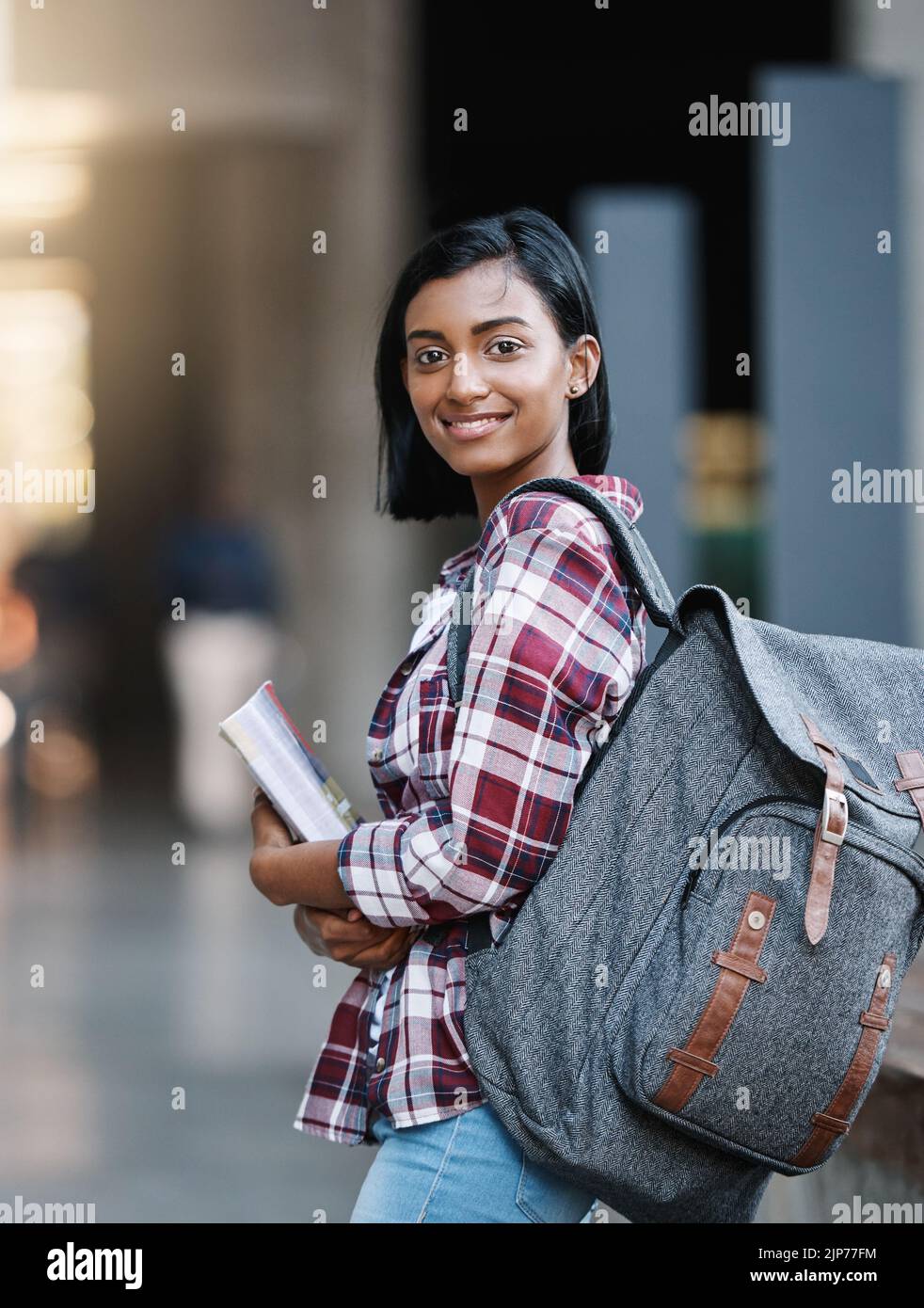 What class have you got next. Rearview portrait of an attractive young ...