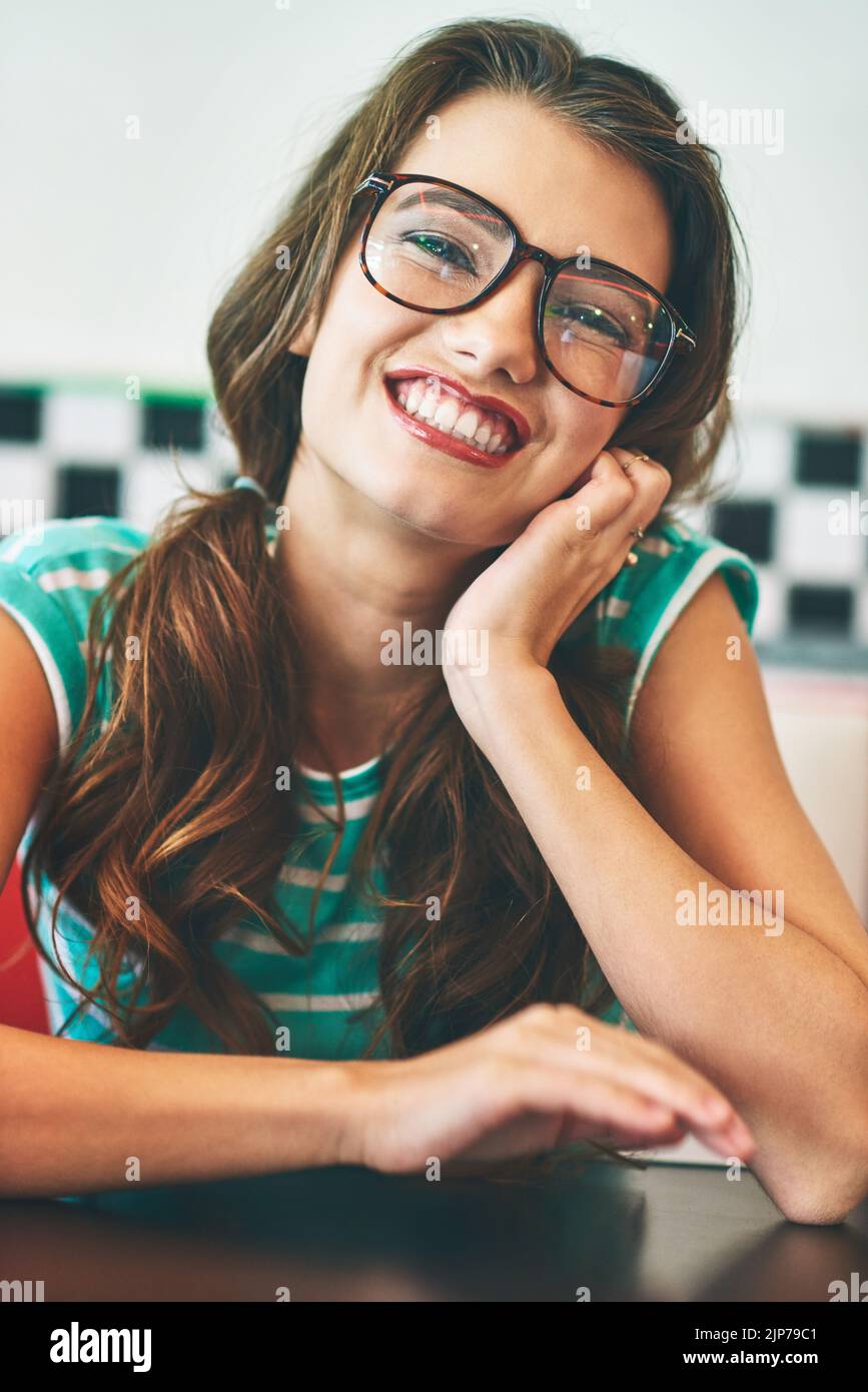 Shes a total cutie in the diner. a beautiful young woman in a diner ...