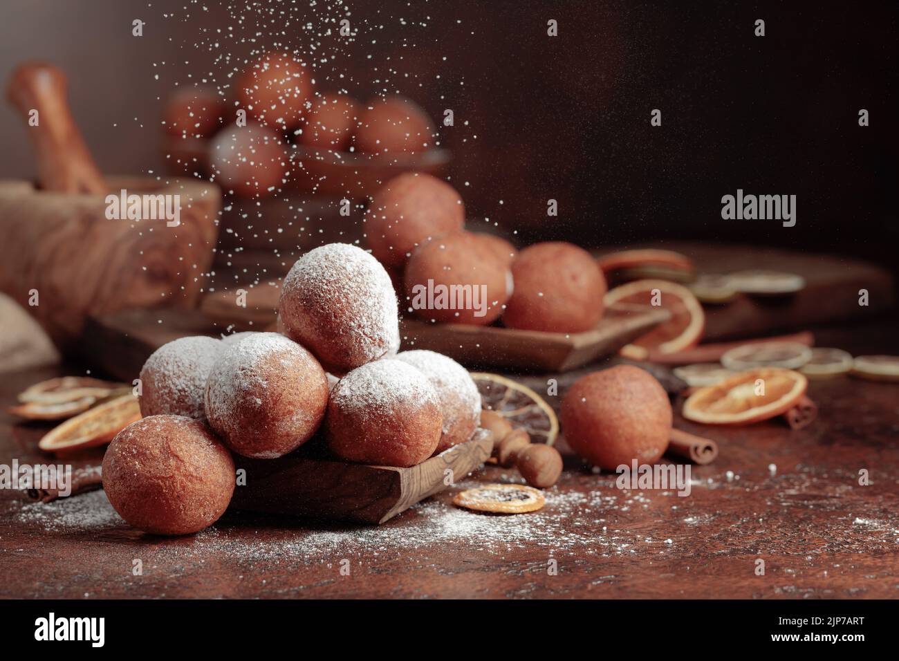 Balls of freshly baked homemade cottage cheese doughnuts sprinkled with ...