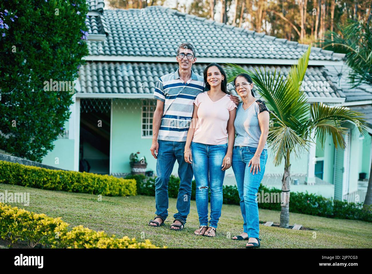 Nothing feels as good as coming back home. Portrait of a happy young ...