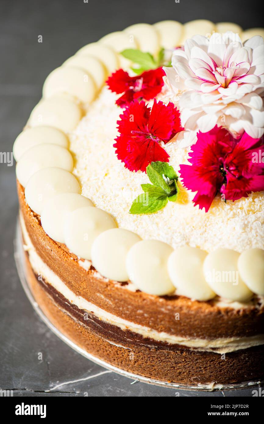 Strawberry Sponge Cake with Mascarpone Cream fresh flowers and shredded ...