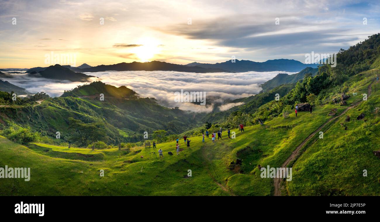 Tourists are excited to watch the sunrise and the valley filled with ...