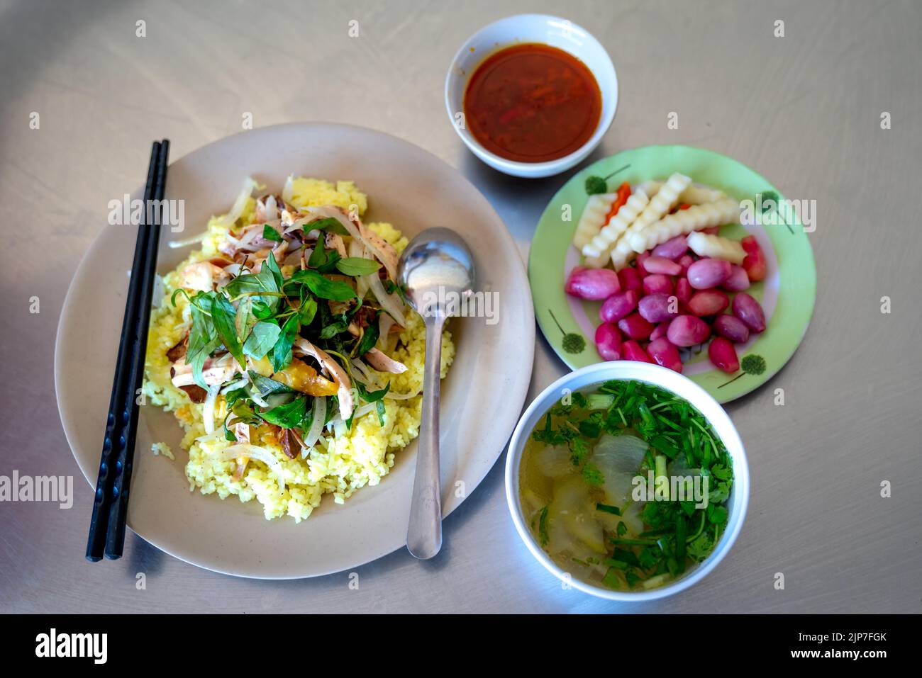 Close-up photo of Tam Ky chicken rice plate. This is a famous delicious ...