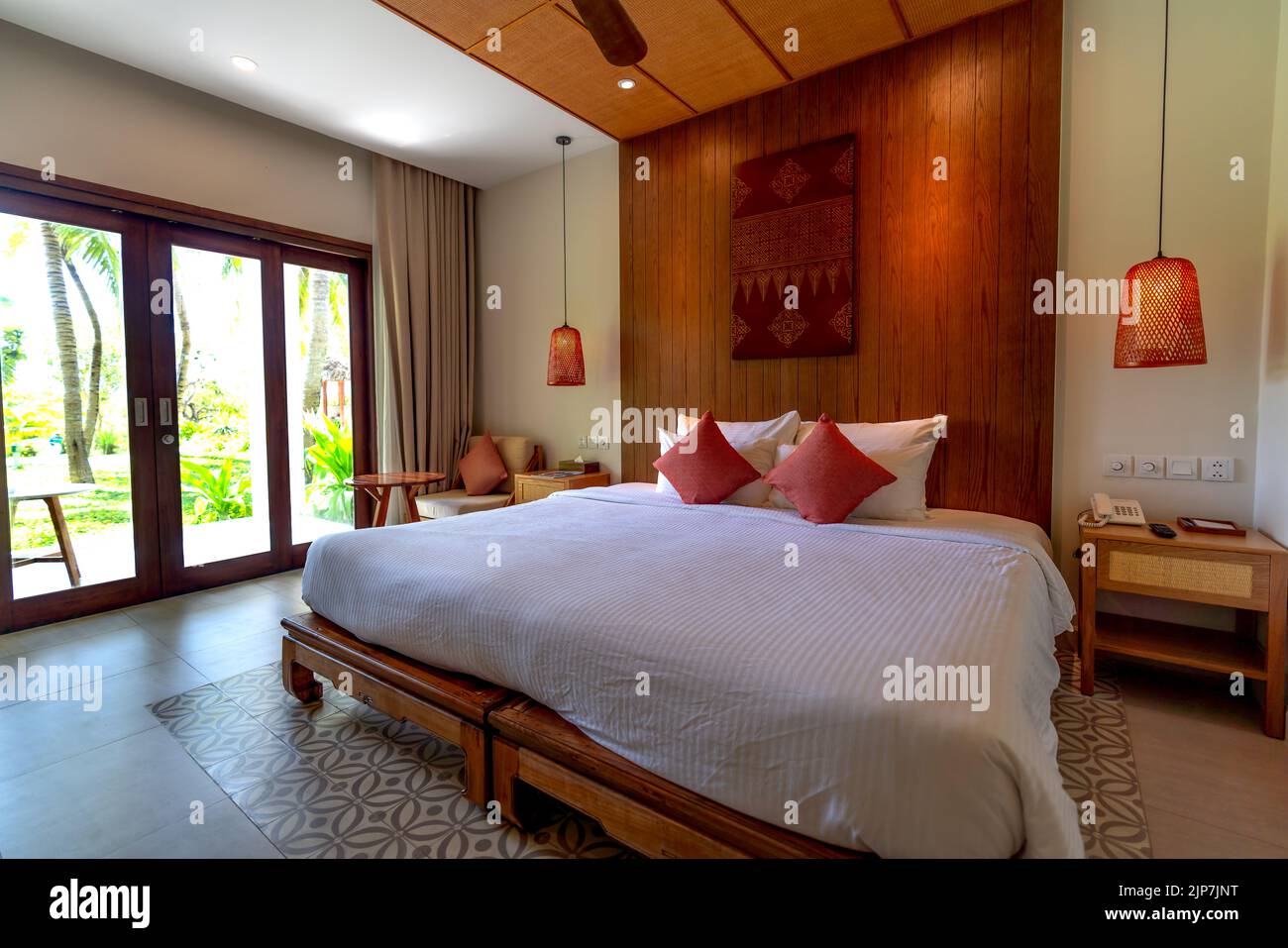 See the interior of a room at the 4-star Pax Ana Resort in Doc Let ...