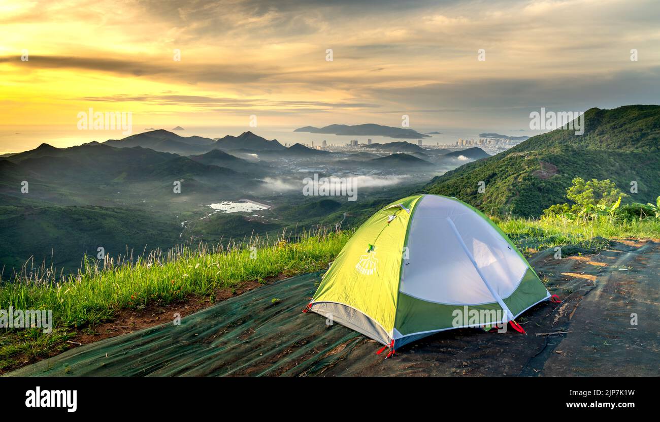 camping tent on the high mountain, looking into the distance is the ...