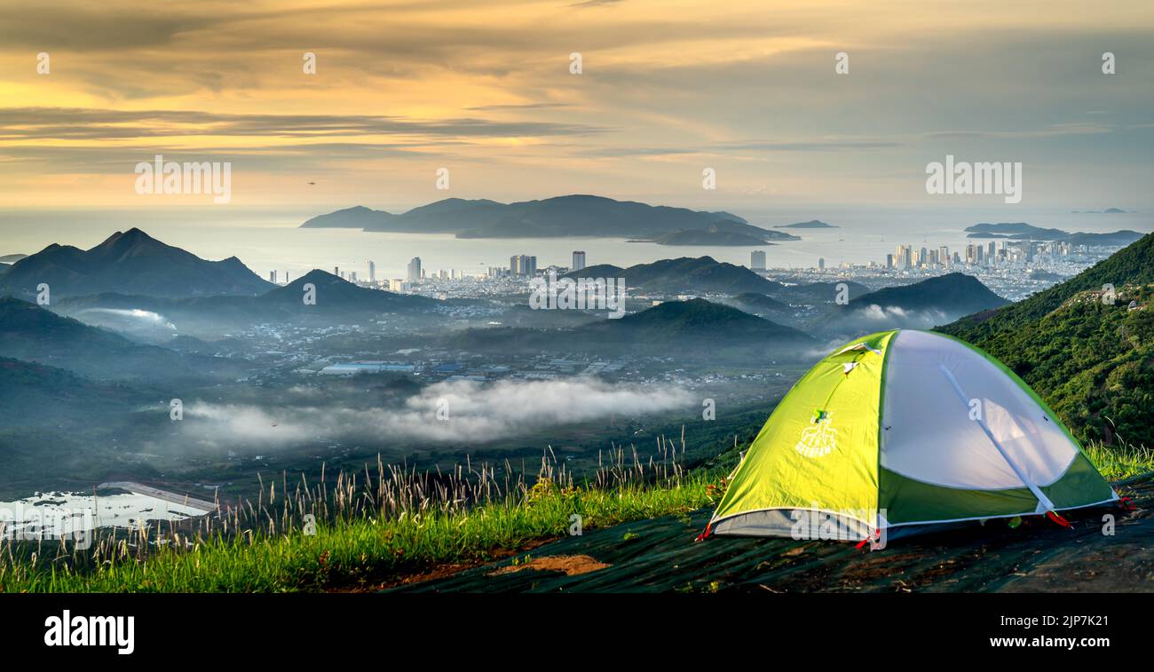 camping tent on the high mountain, looking into the distance is the ...