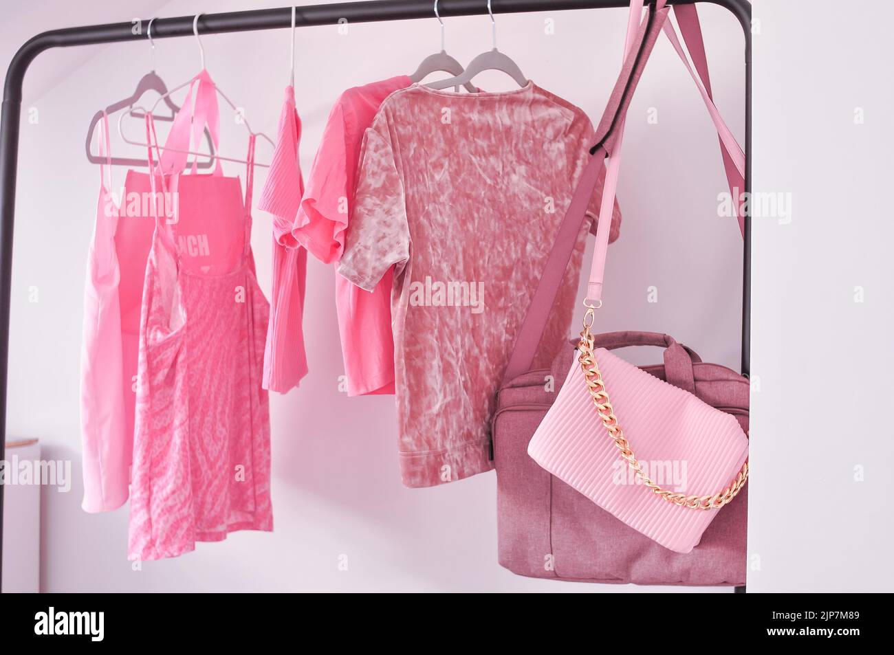 Pink woman's clothes in fitting room ,summer and spring look for girls ...