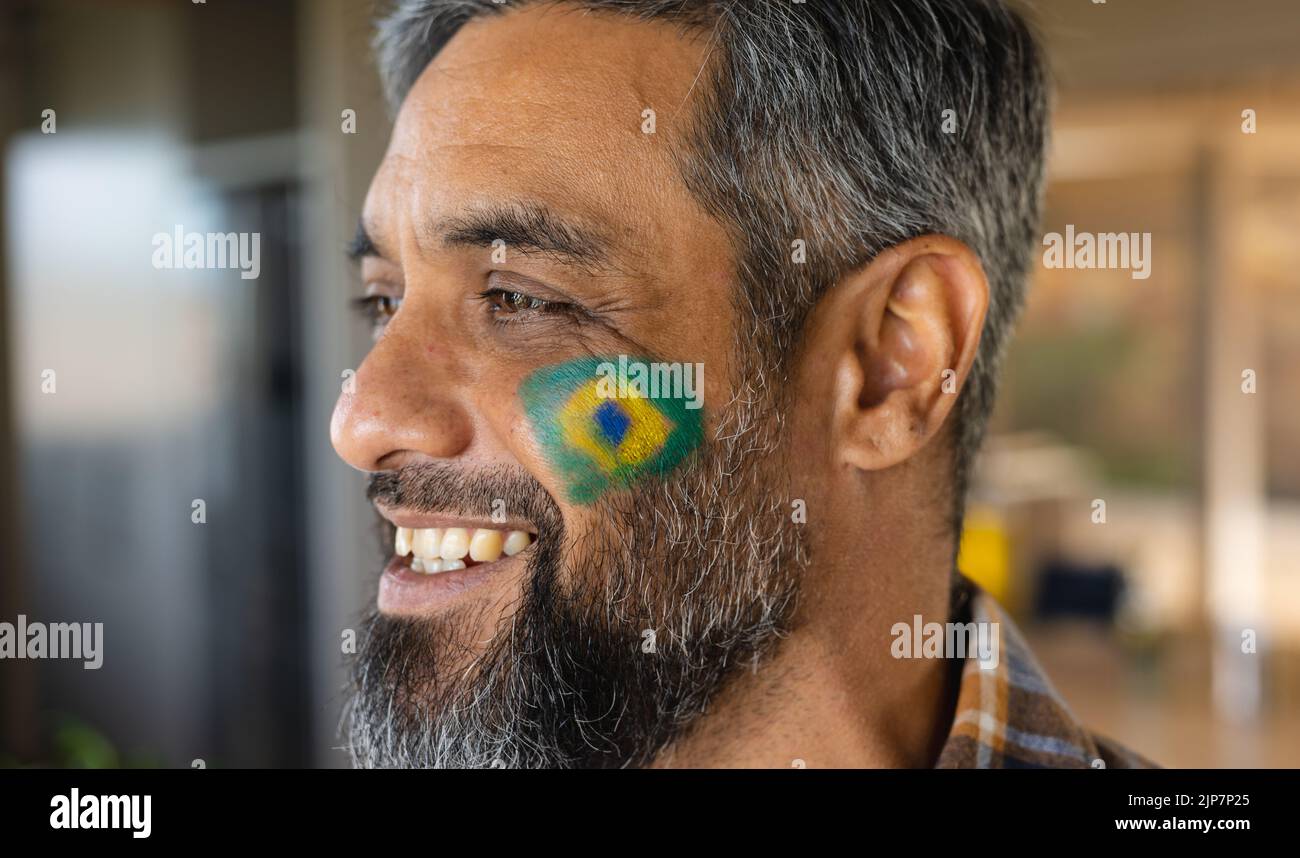 Happy biracial man flag brazil hi-res stock photography and images - Alamy