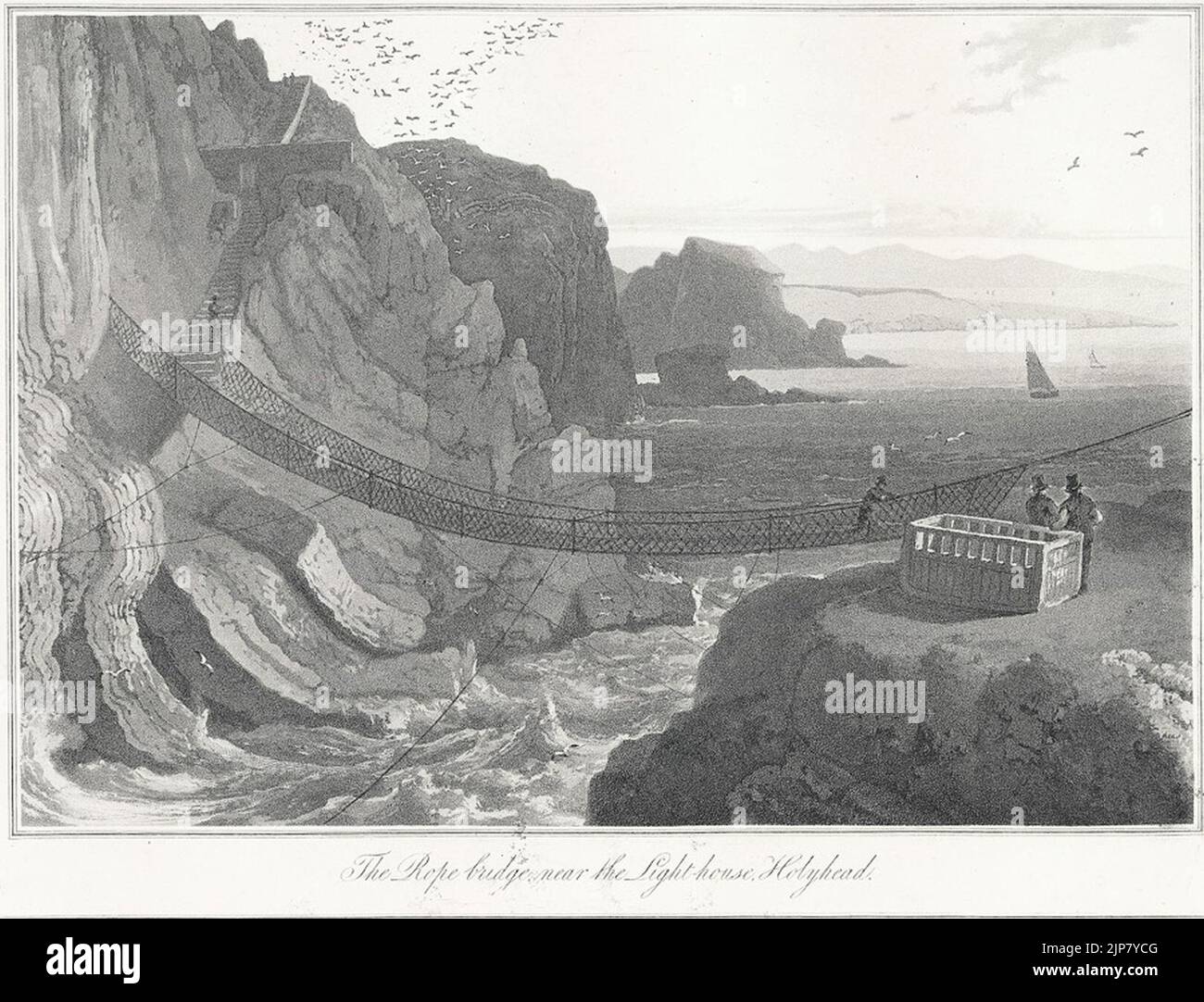 The rope bridge near the light-house, Holyhead Stock Photo - Alamy
