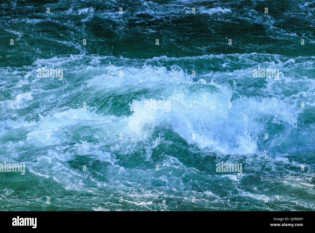 Turbulent turquoise water and white waves in strong current Stock Photo ...