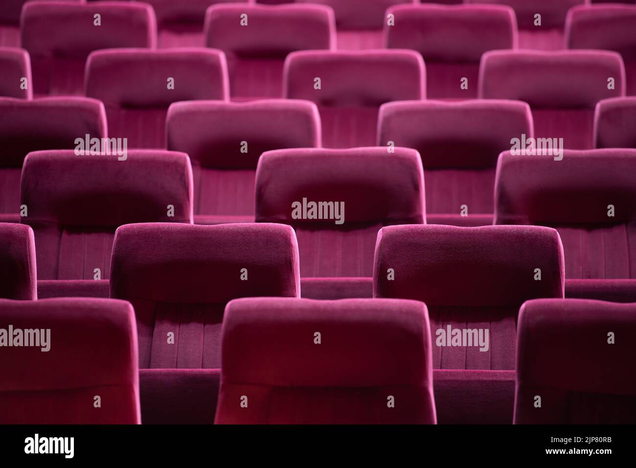 Empty cinema hall with red seats. Movie theatre Stock Photo - Alamy