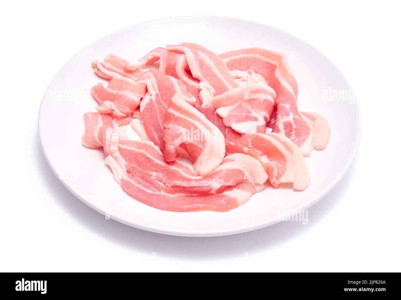 Bacon strips on ceramic plate isolated on white background Stock Photo ...