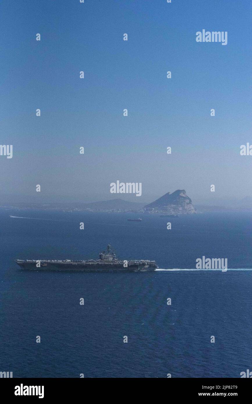 The ship and its carrier strike group are conducting naval operations ...