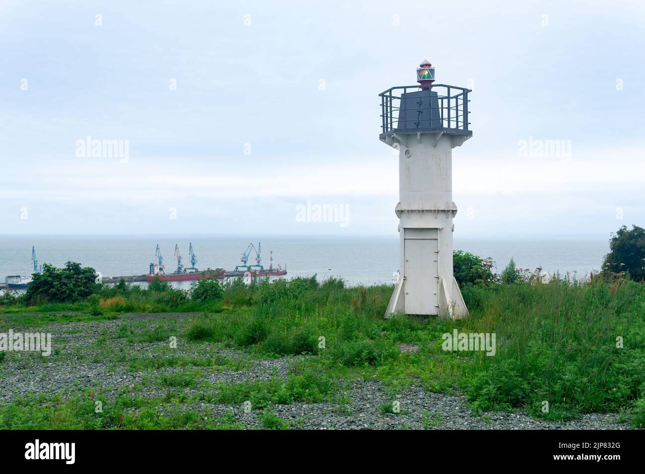 automatic lighthouse with sector light on a high cape above the sea ...