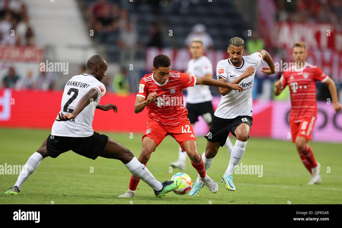 Jamal Musiala of Bayern Muenchen Evan N`Dicka of Eintracht Frankfurt ...