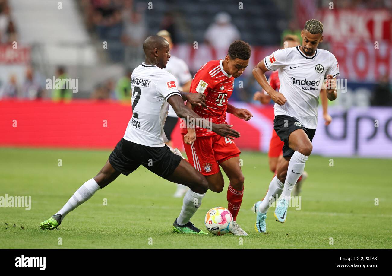 Jamal Musiala of Bayern Muenchen Evan N`Dicka of Eintracht Frankfurt ...