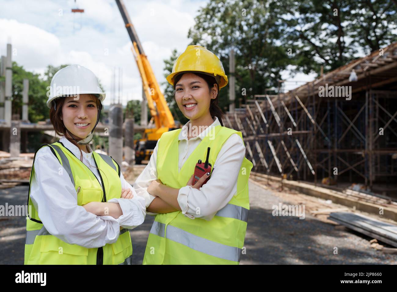 Structural engineer and architect discussing and working with ...