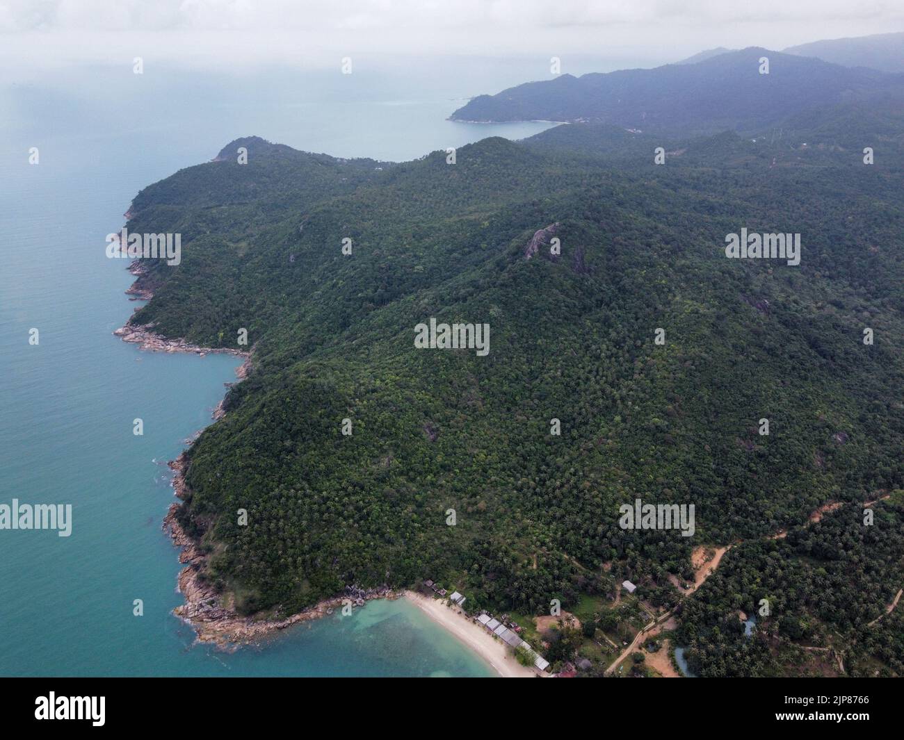 A bird's eye view of Koh Phangan island covered with greenery in ...