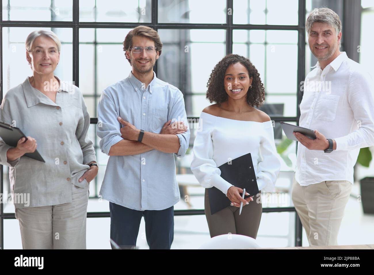 A group of young modern people in smart casual clothes Stock Photo - Alamy