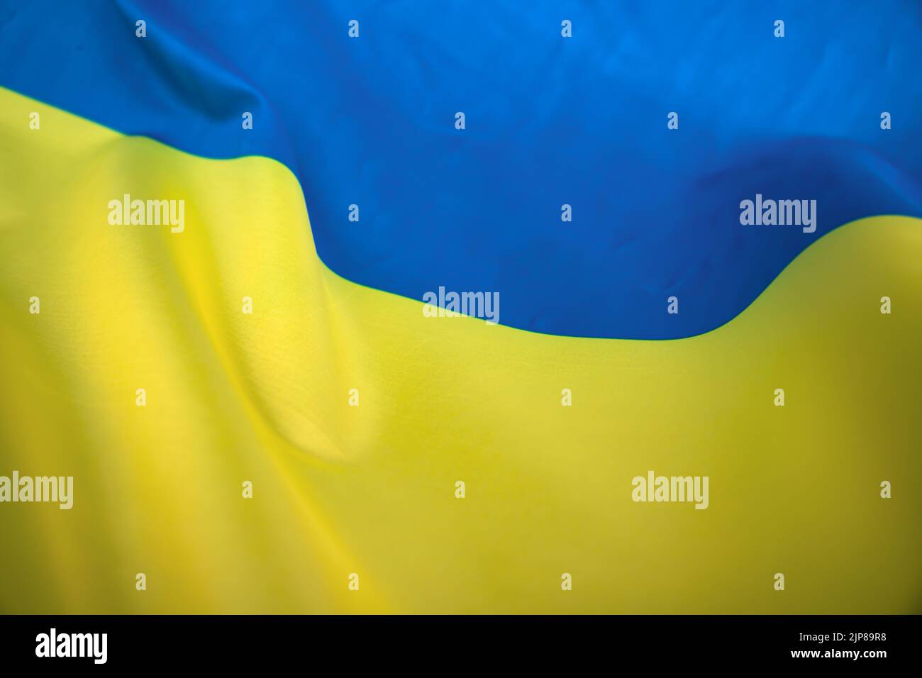 Flag of Ukraine, UA. Blue and yellow colors. Close up shot, background ...