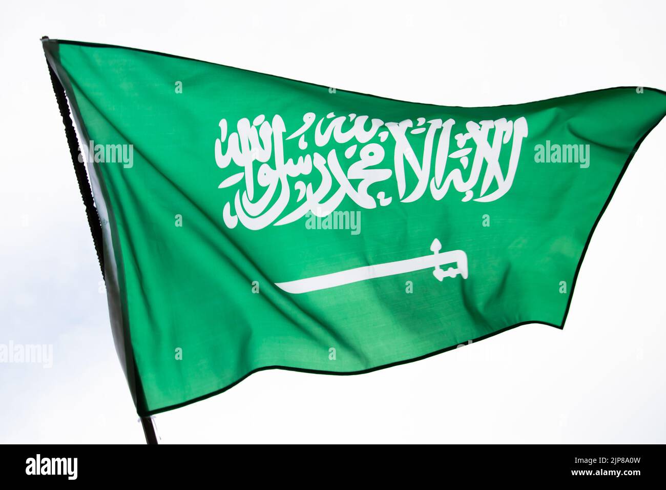 Saudi Arabia flag, Statement translation: There is no God but Allah ...