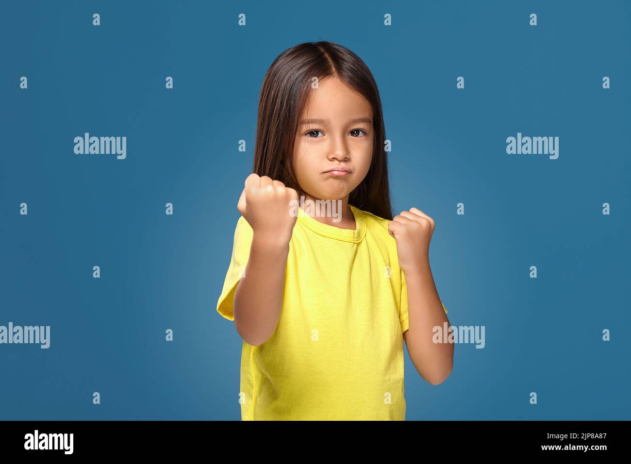 Angry little kid showing frustration and disagreement Stock Photo - Alamy
