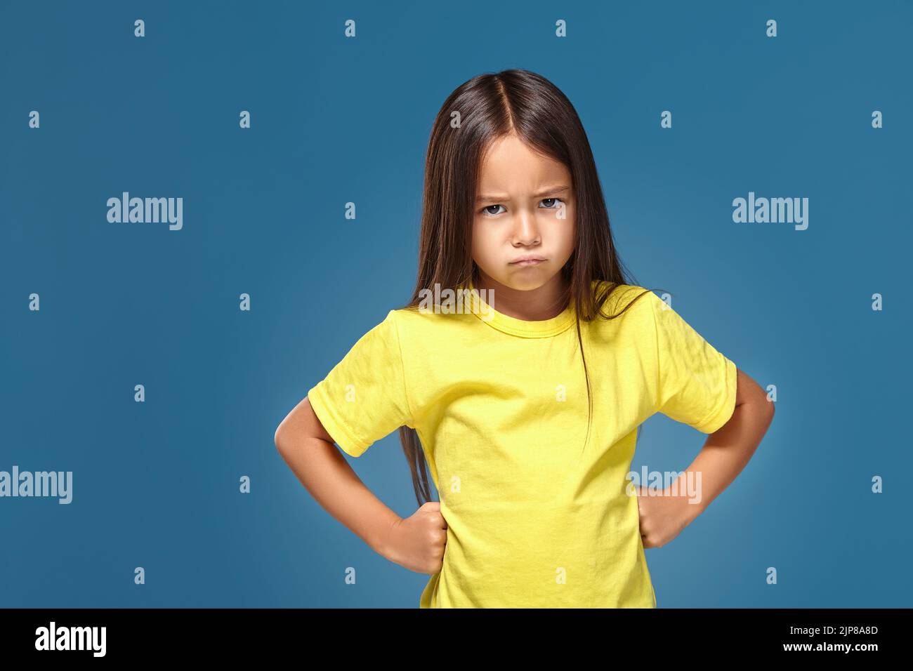 Angry little kid showing frustration and disagreement Stock Photo - Alamy
