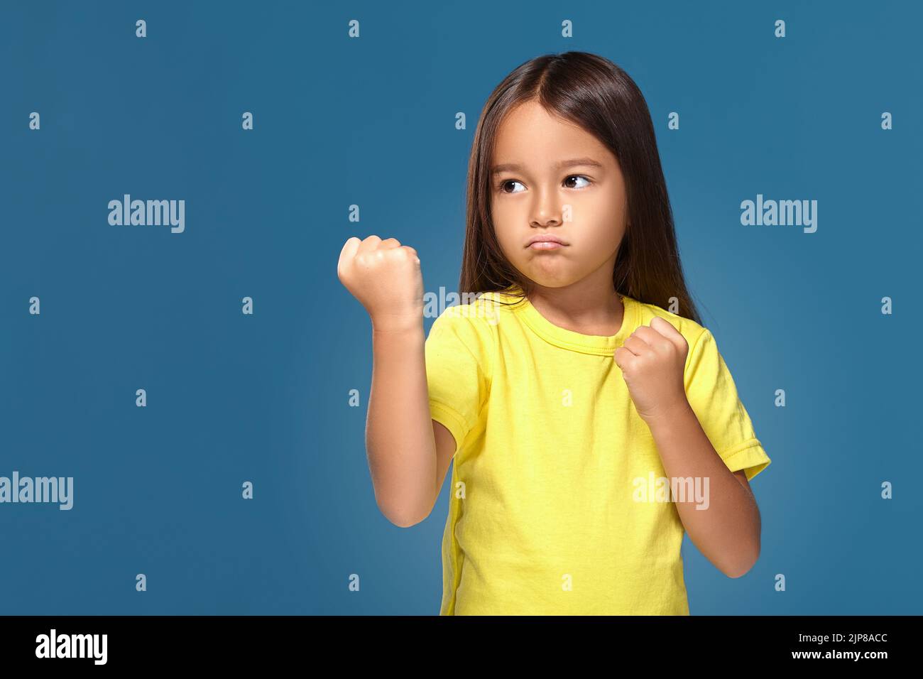 Angry little kid showing frustration and disagreement Stock Photo - Alamy