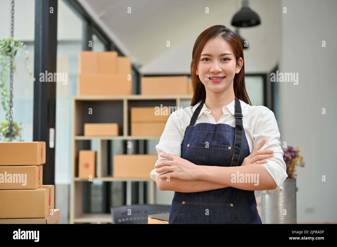Portrait, Successful and confident young Asian female e-commerce ...