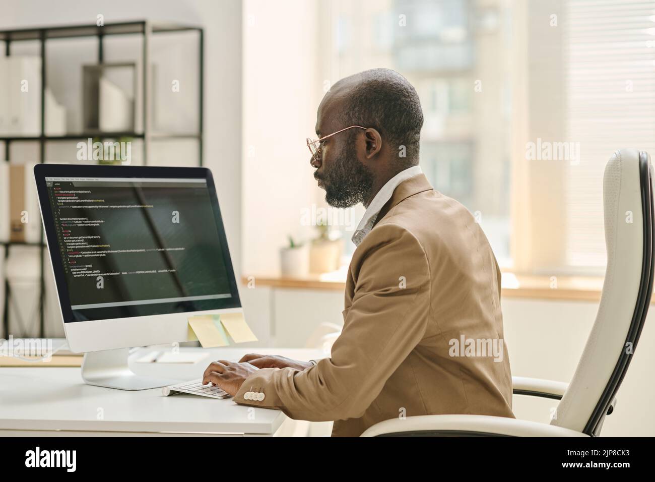 Computer programmer workplace digital technology hi-res stock ...