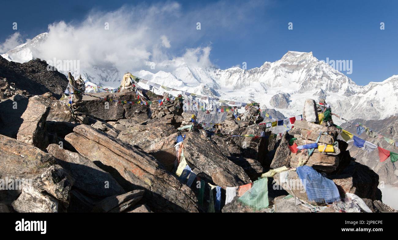 Panoramic view of mount Cho Oyu and mount Gyachung Kang with prayer ...