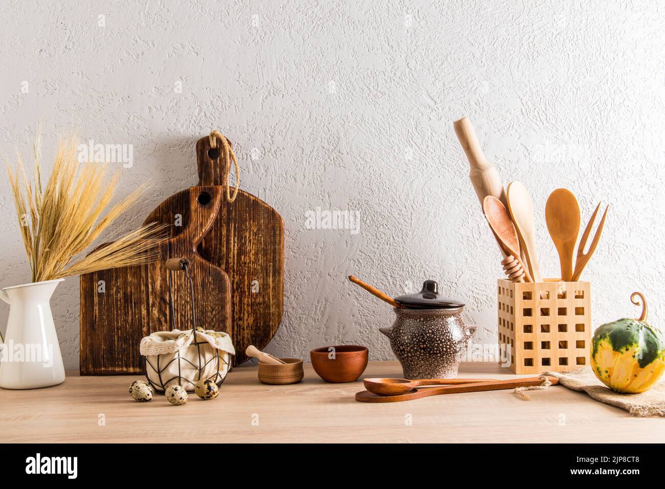 wooden countertop of the kitchen farmhouse with various kitchen ...