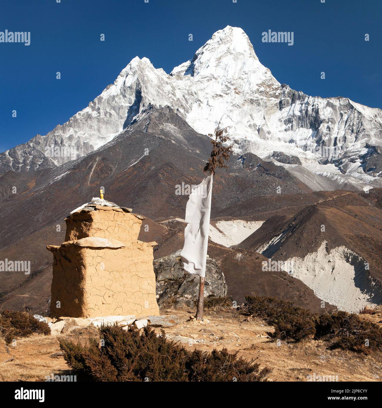 Mount Ama Dablam with chorten and prayer flag near Pangboche village on ...