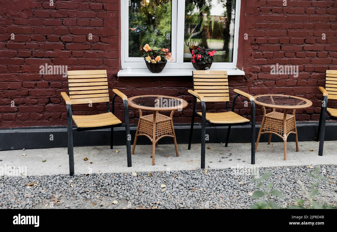 outdoor cafe with flowers. street restaurant. No people Stock Photo - Alamy