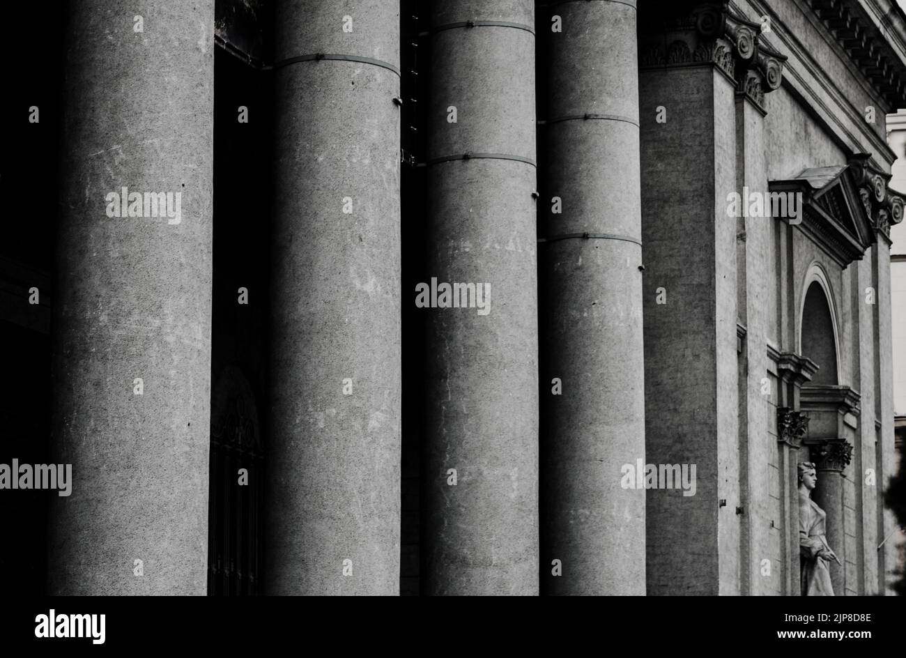 classic columns of old building. grey city background. historical ...