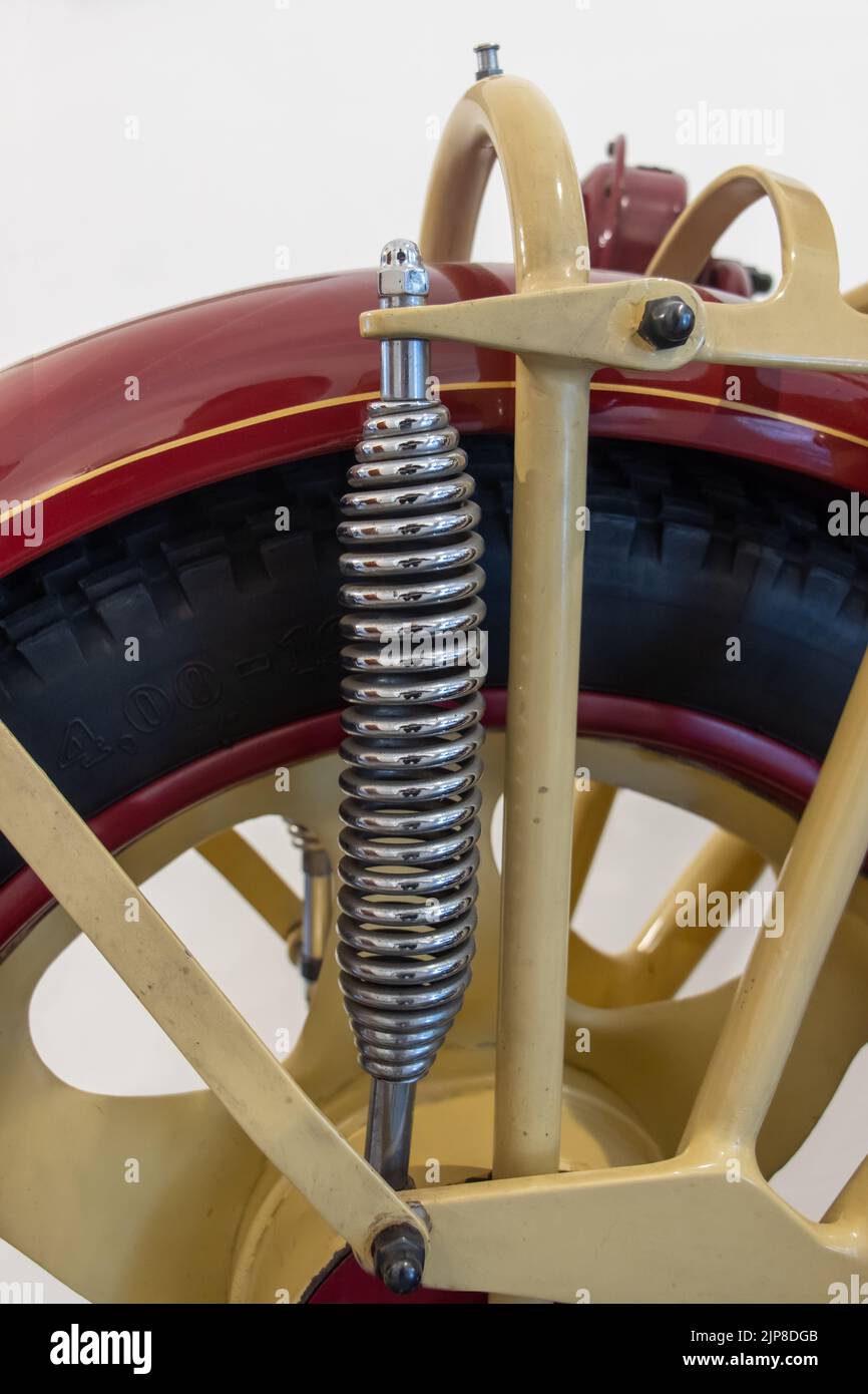Spring on the wheel of a retro motorcycle Stock Photo - Alamy