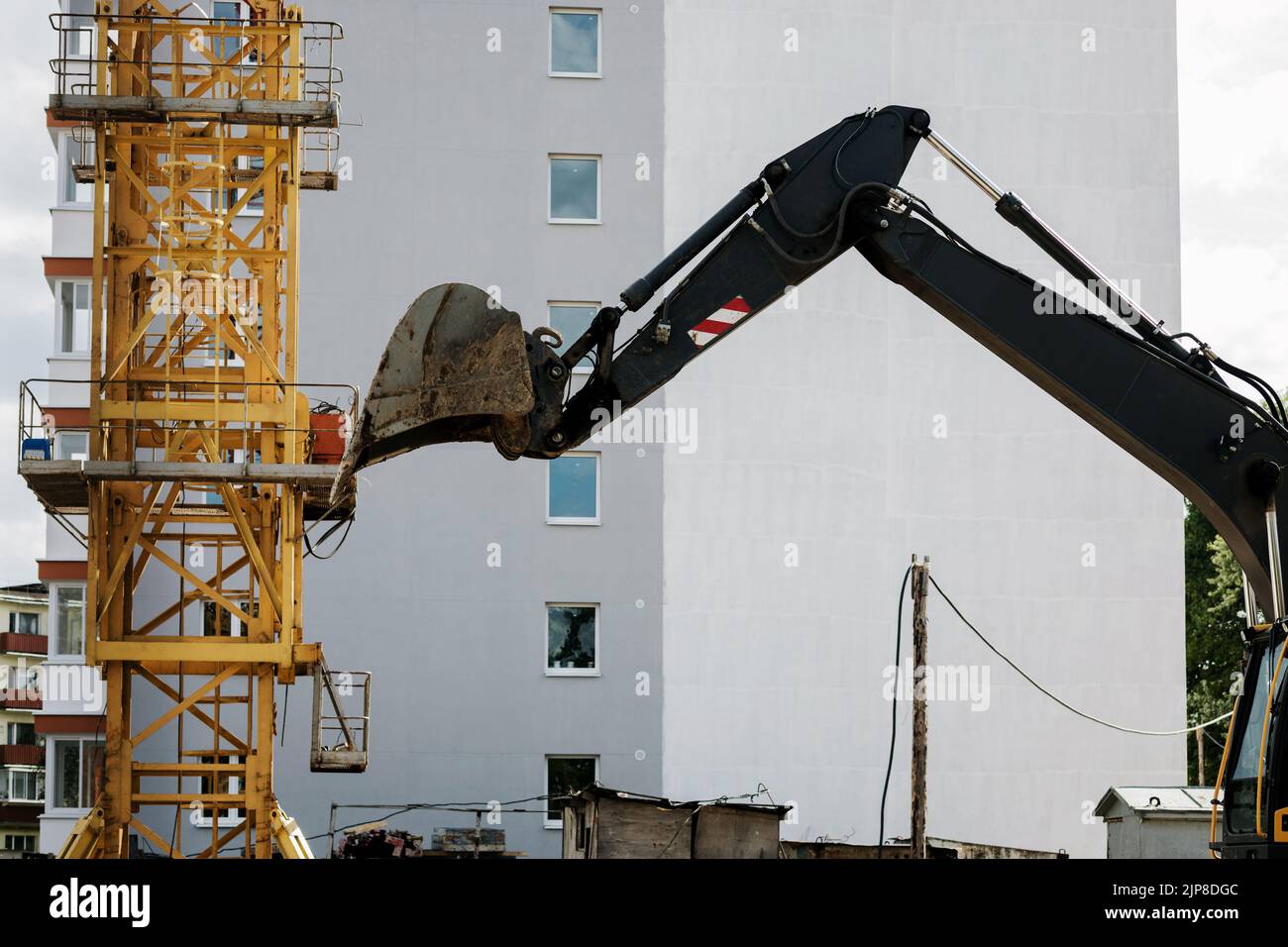 Excavator with bucket lift. Industrial background. Digger bucket close ...