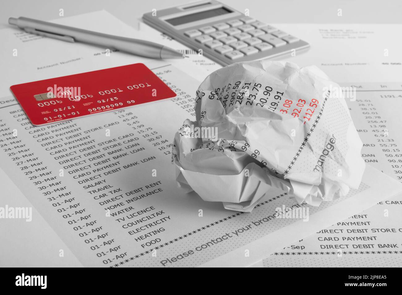 Scrunched up Bank Statement showing account in debt Stock Photo - Alamy