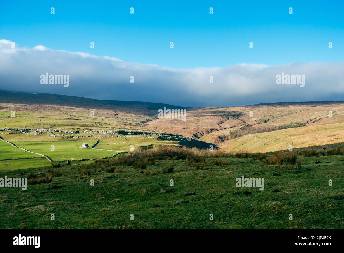 UK landscapes: Views over a wild Malham Moor in the sunshine with stone ...