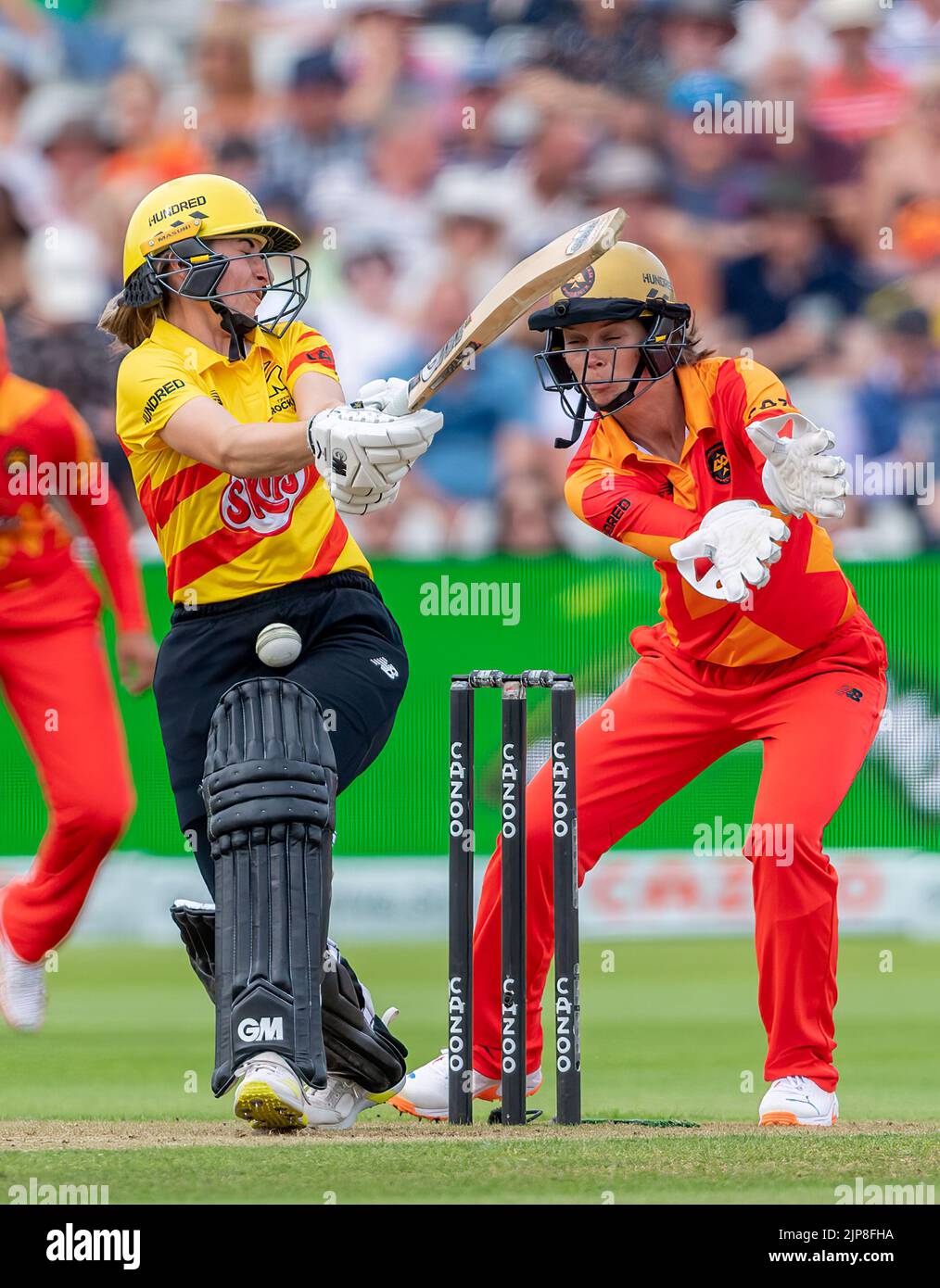 Marie Kelly of Trent Rockets gets hit by the ball, watched by keeper ...