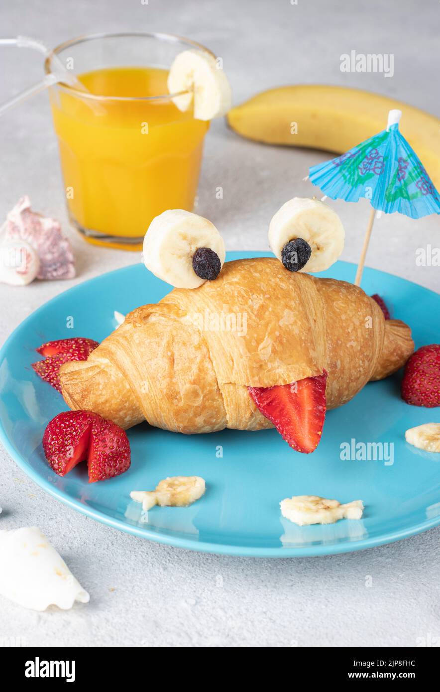 Fun food for kids - crab shaped croissant with strawberry and banana on ...