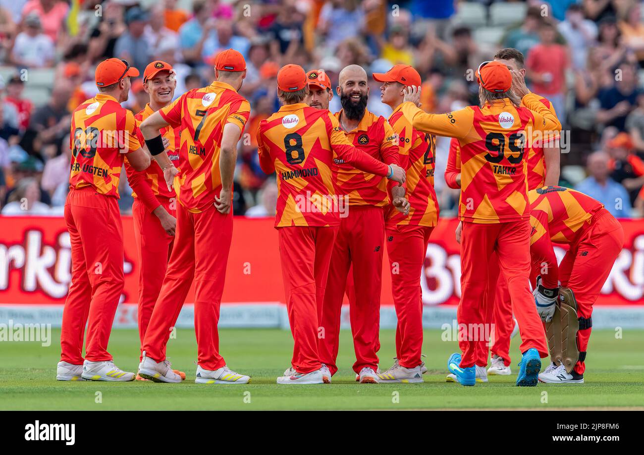 Moeen Ali (centre) smiles and celebrates with his Birmingham Phoenix ...
