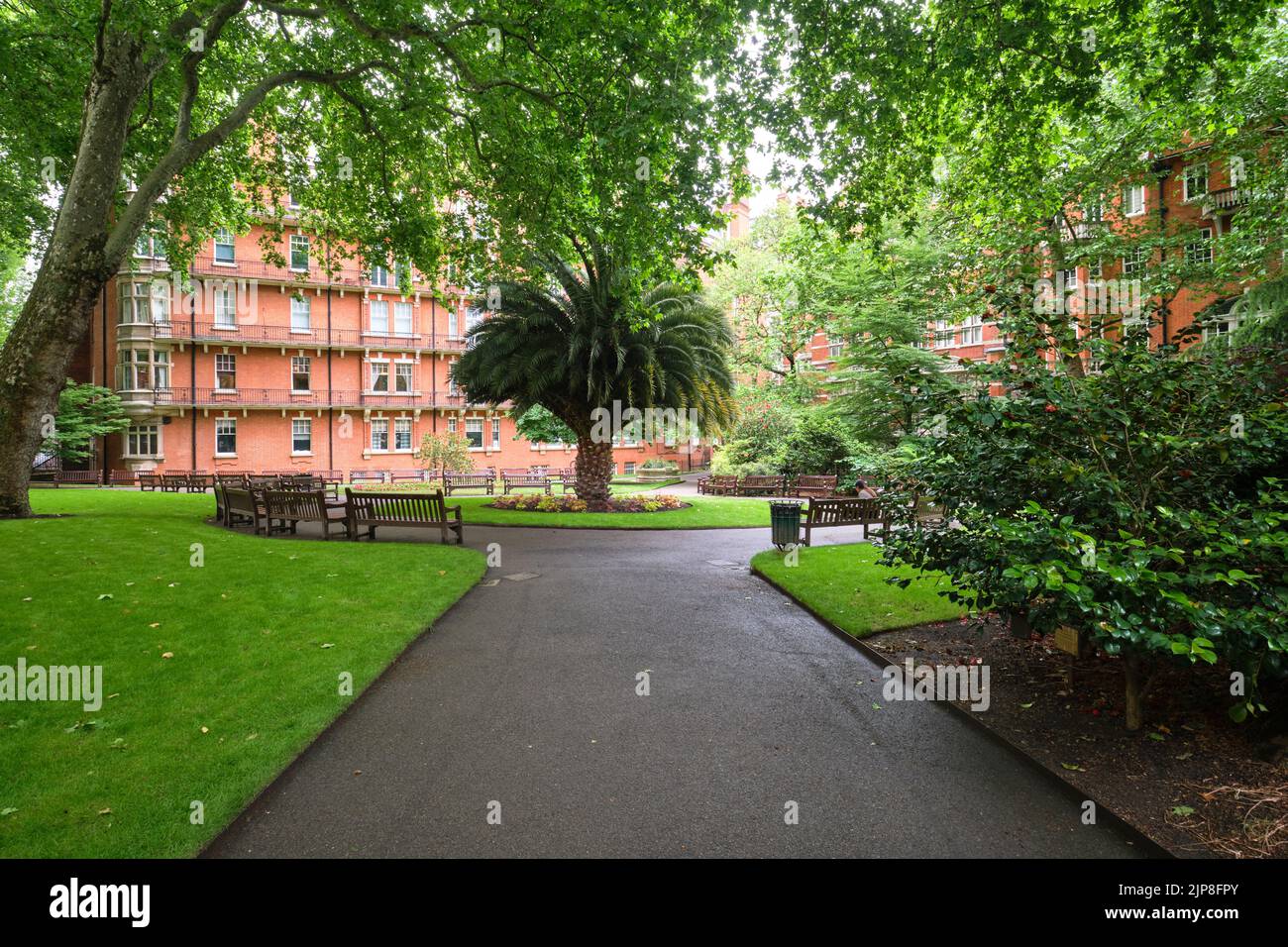 A lush green lawn and manicured landscaping at the intimate ...