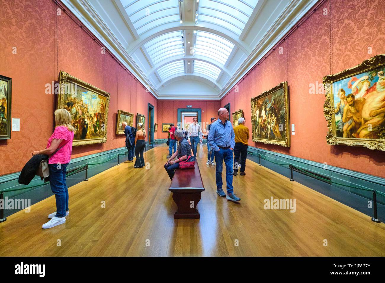 Art patrons and tourists enjoying one of the painting galleries. At The ...