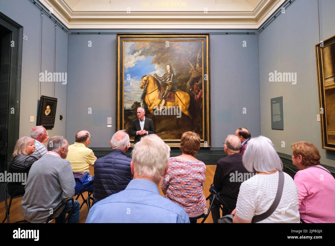 A docent teaches a group of students about a specific Old Master ...