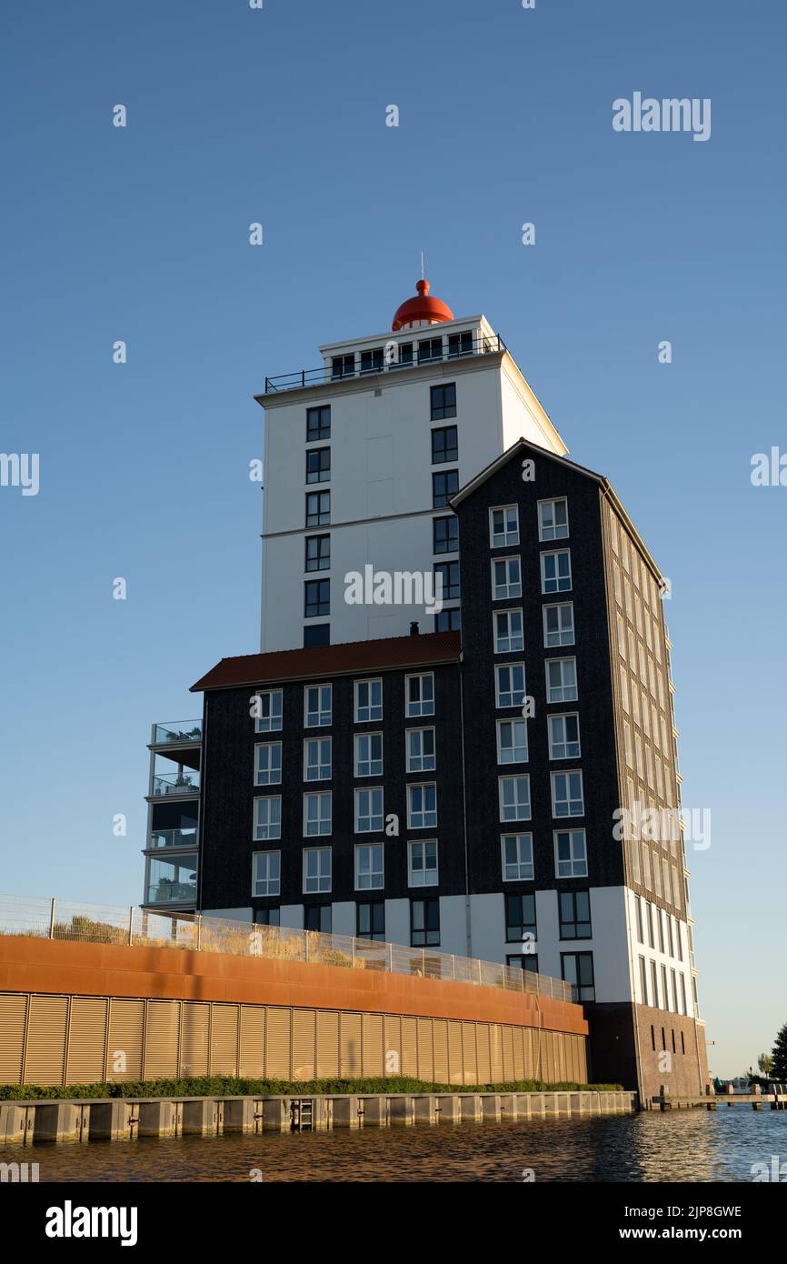 A low-angle view of modern buildings on a cloudy day Stock Photo - Alamy