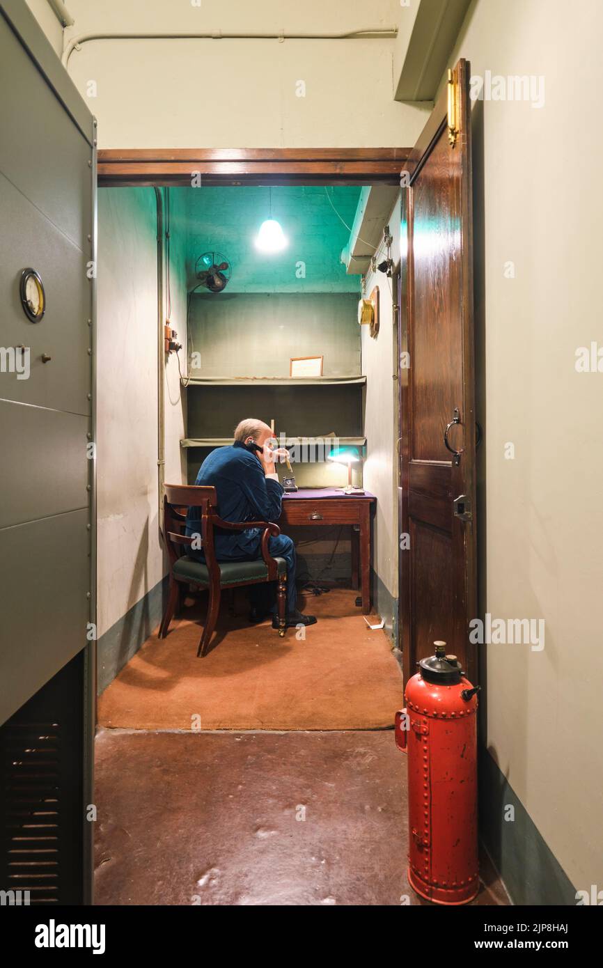 Making a phone call at the communications alcove desk area. At the ...