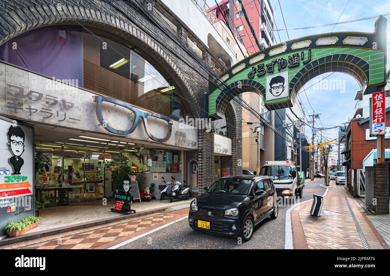nagasaki, kyushu - december 12 2021: Car traffic passing below the gate ...