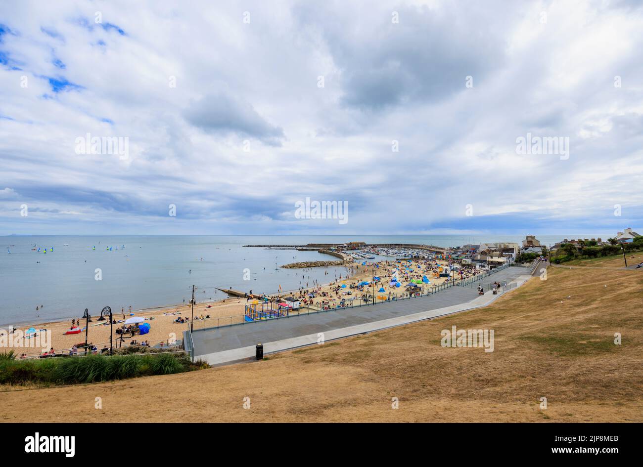 View of the Cobb, shoreline and beach at Lyme Regis, a popular seaside ...