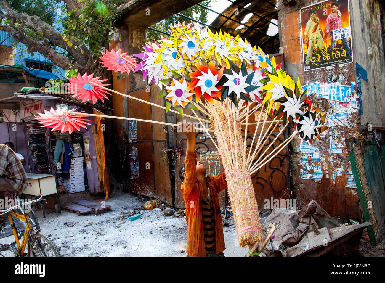 Paper pinwheel vendor, wind pinwheel hawker, Varanasi, Banaras, Benaras ...